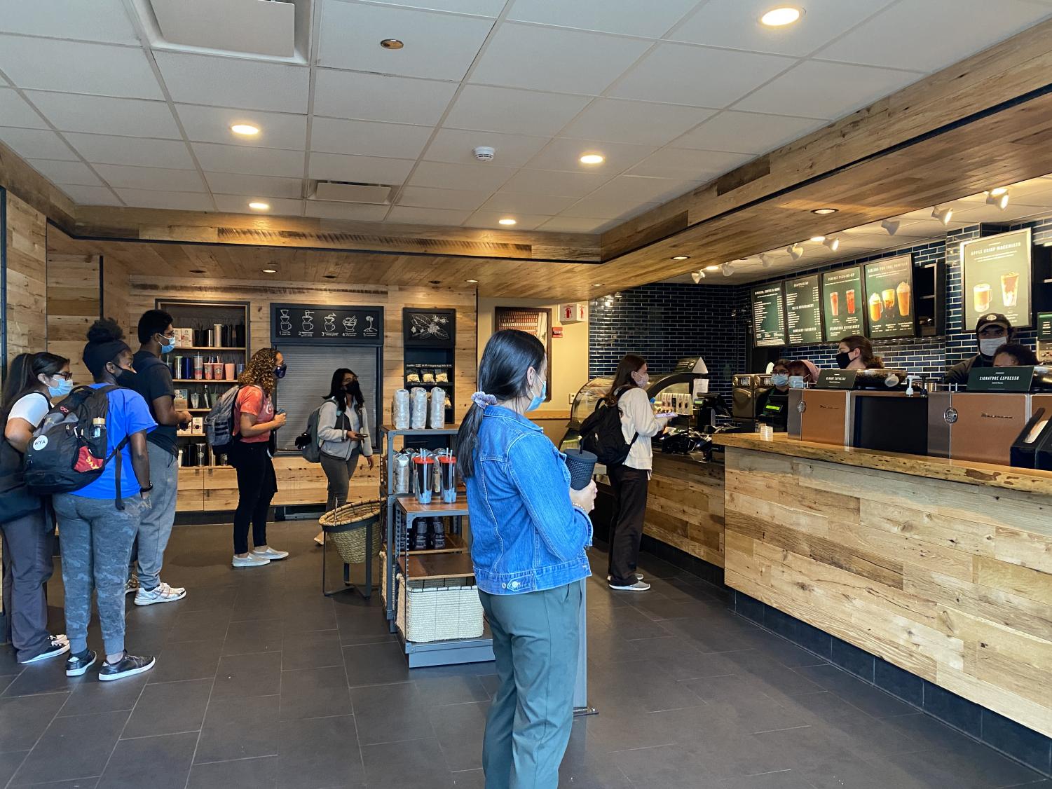 Campus Starbucks re-opens with new hours – The Harbinger